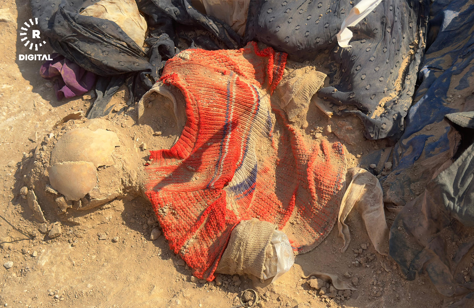 Mass grave containing dozens of Kurds unearthed... | Rudaw.net